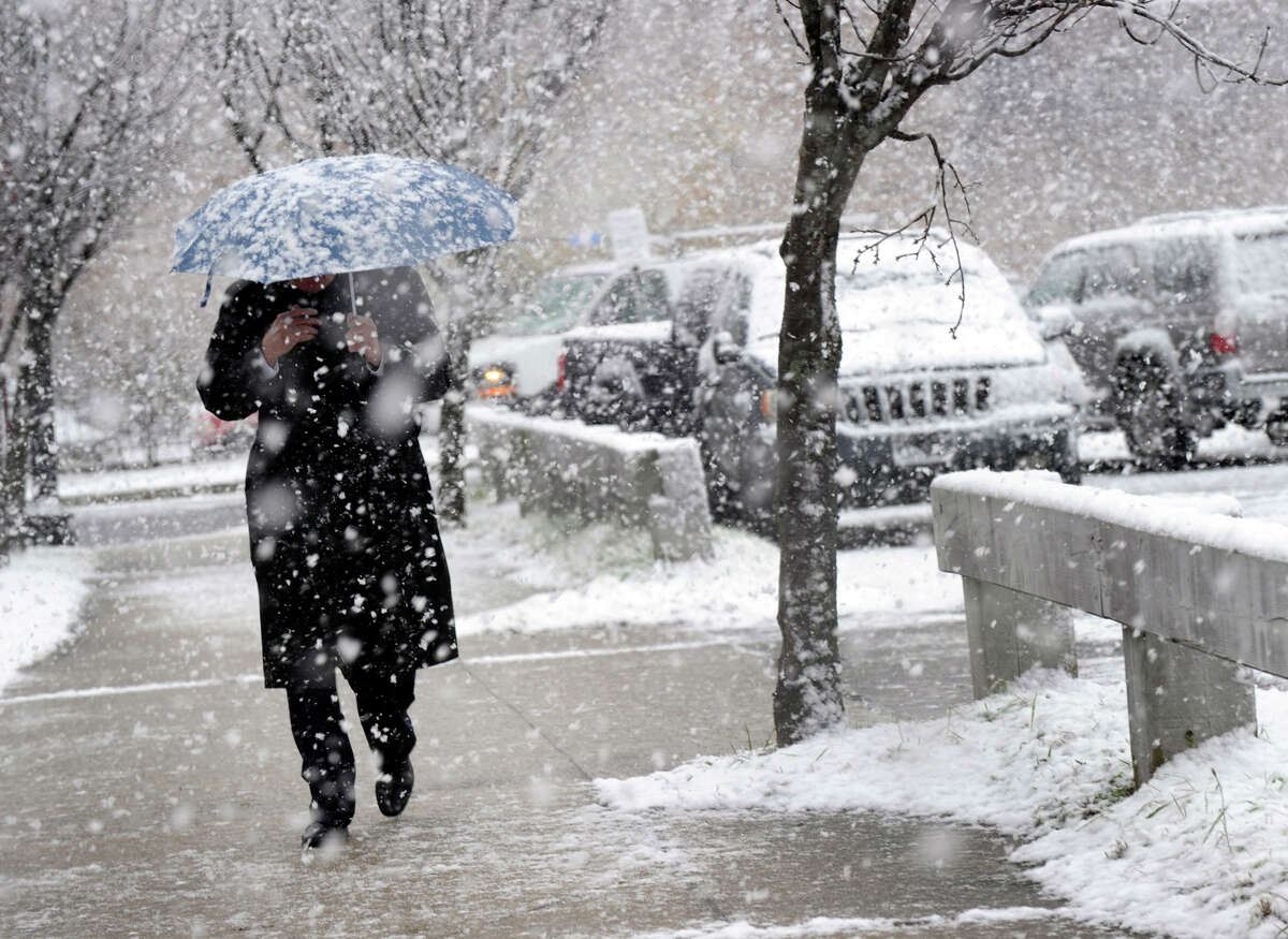 Snow continues to fall, roads remain treacherous