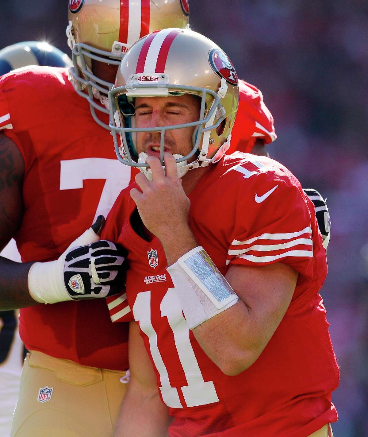 49ers, Rams tie; Alex Smith hurt