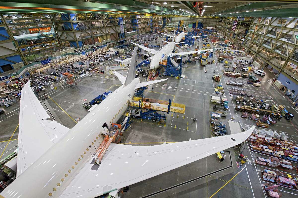 Boeing rolls out first 787 at higher rate