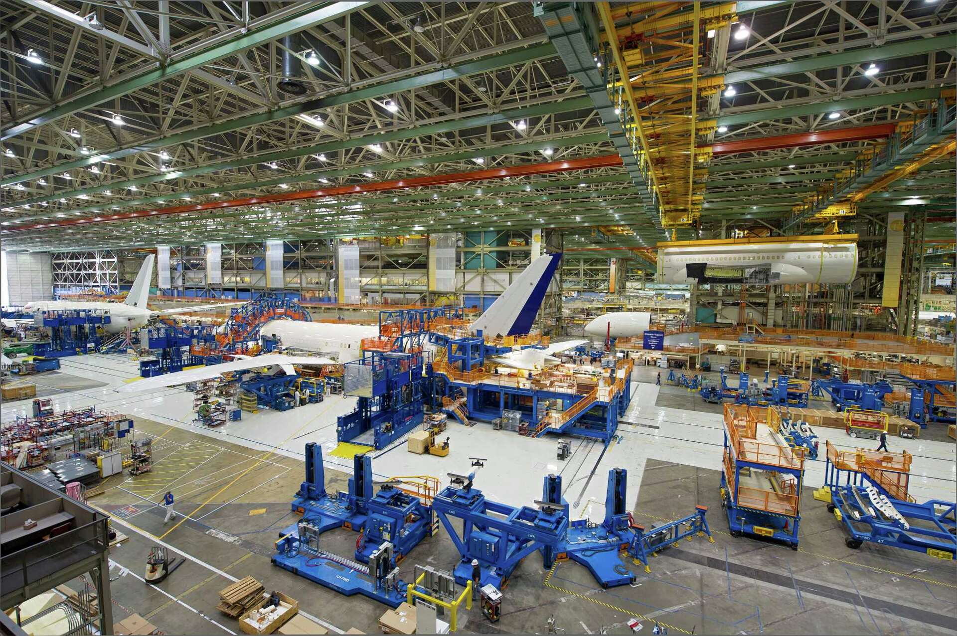 Boeing rolls out first 787 at higher rate