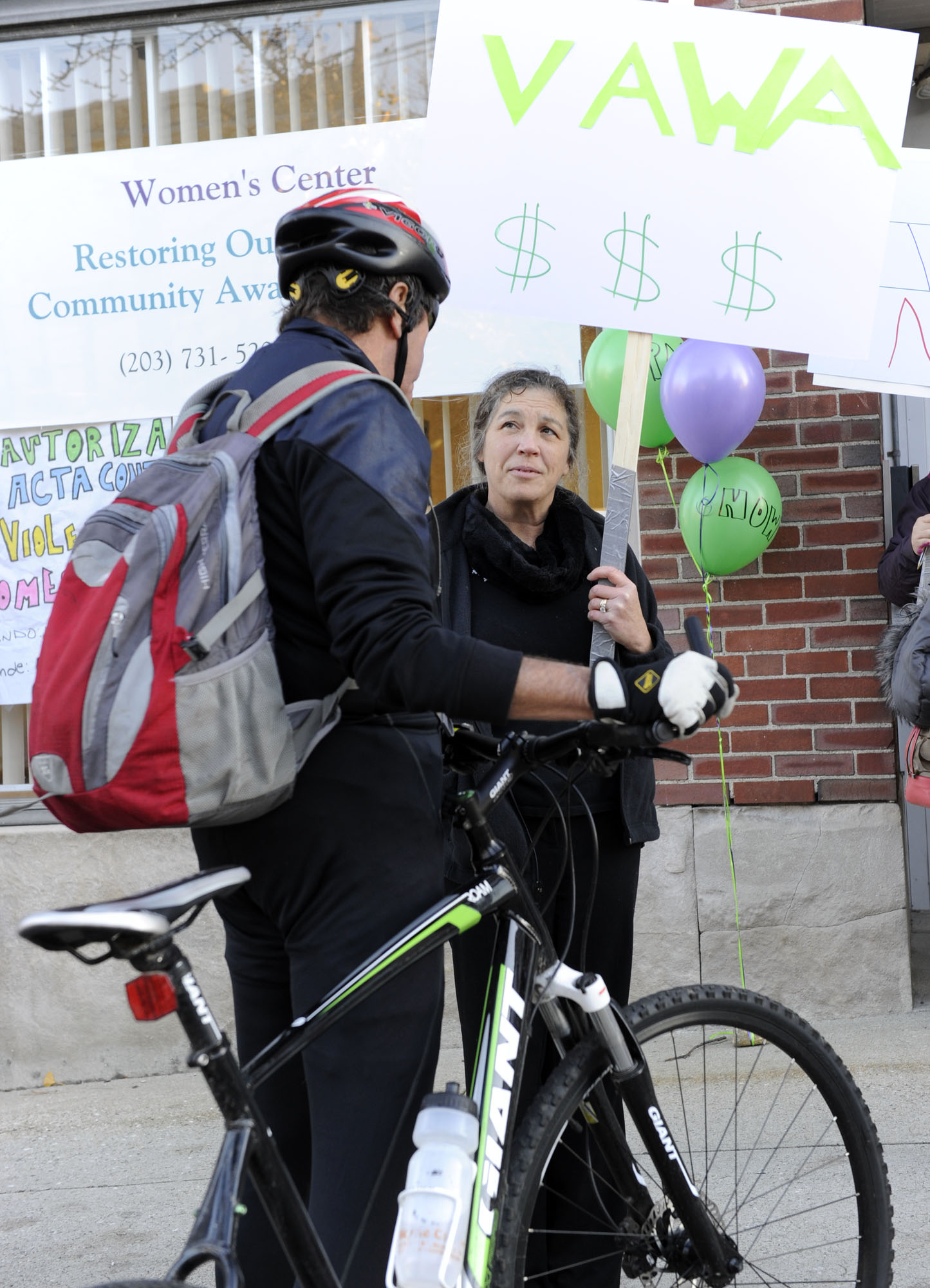 Protesters urge passage of violence against women bill