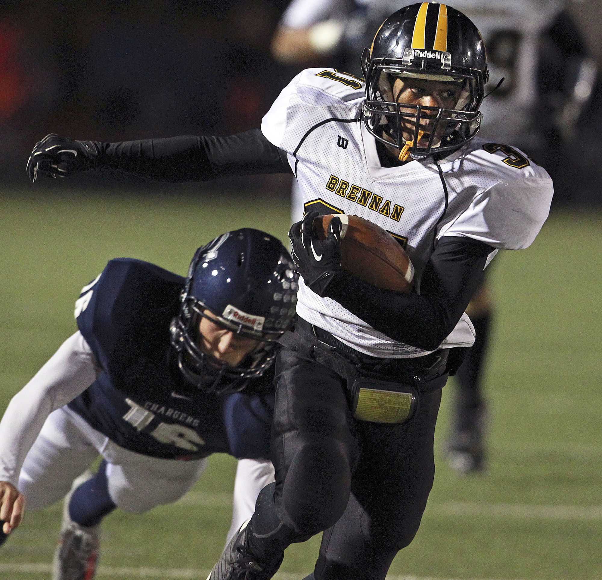 Brennan posts first playoff win