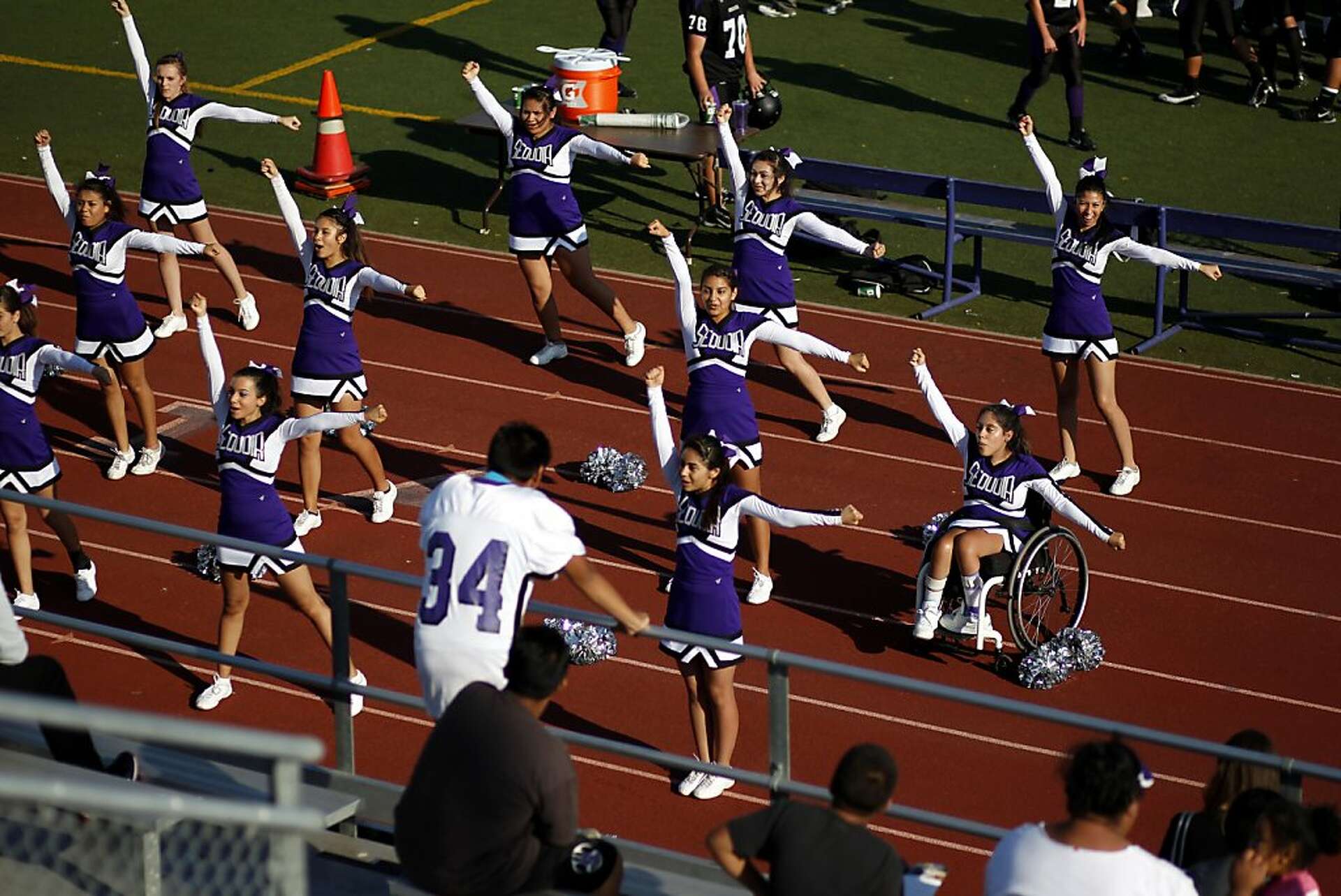 Cheerleader has spirit - and wheelchair