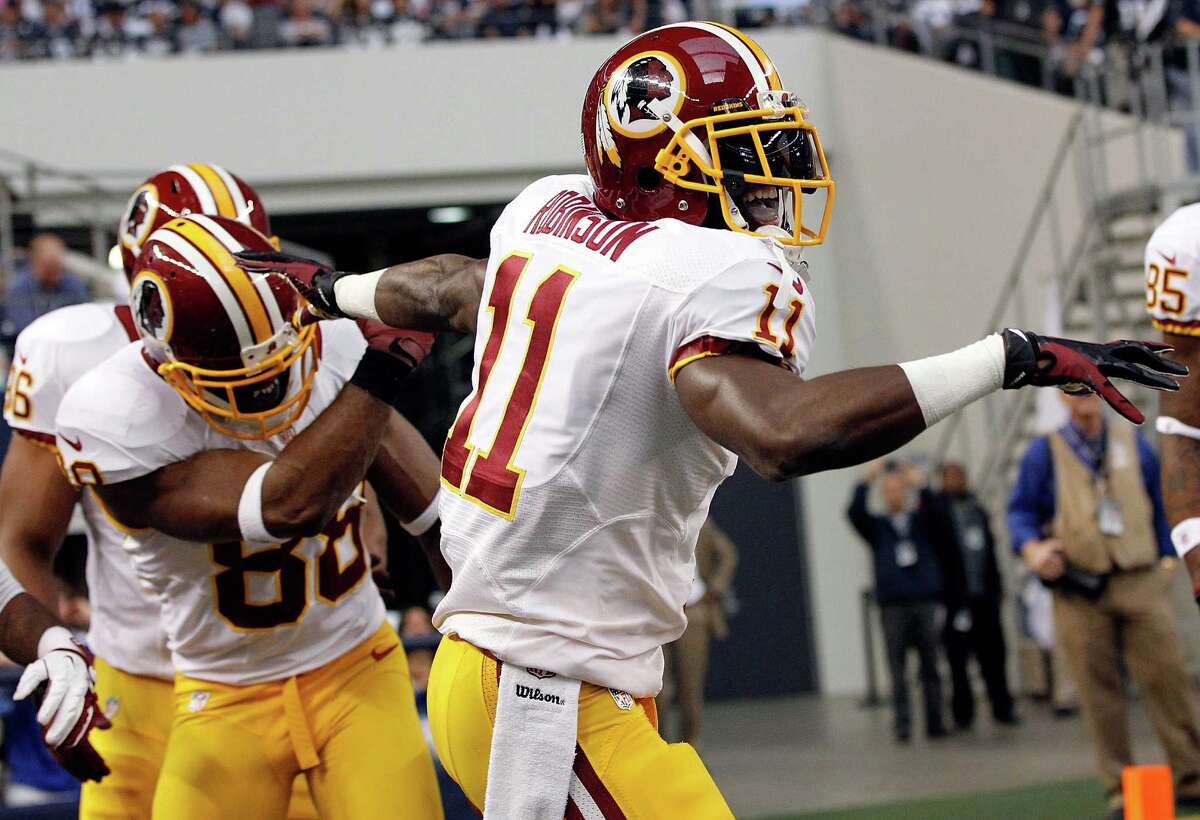 Redskins' RG3 feasts on Cowboys' defense