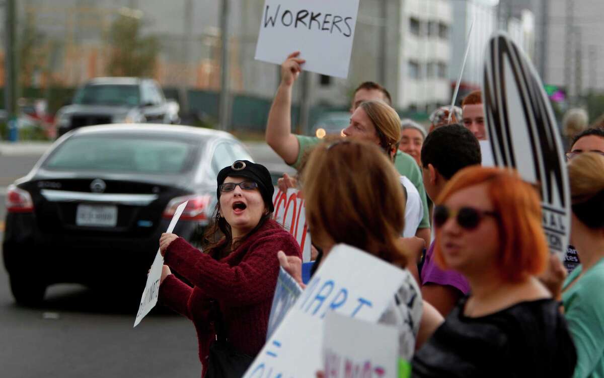 Small protest greets Wal-Mart shoppers
