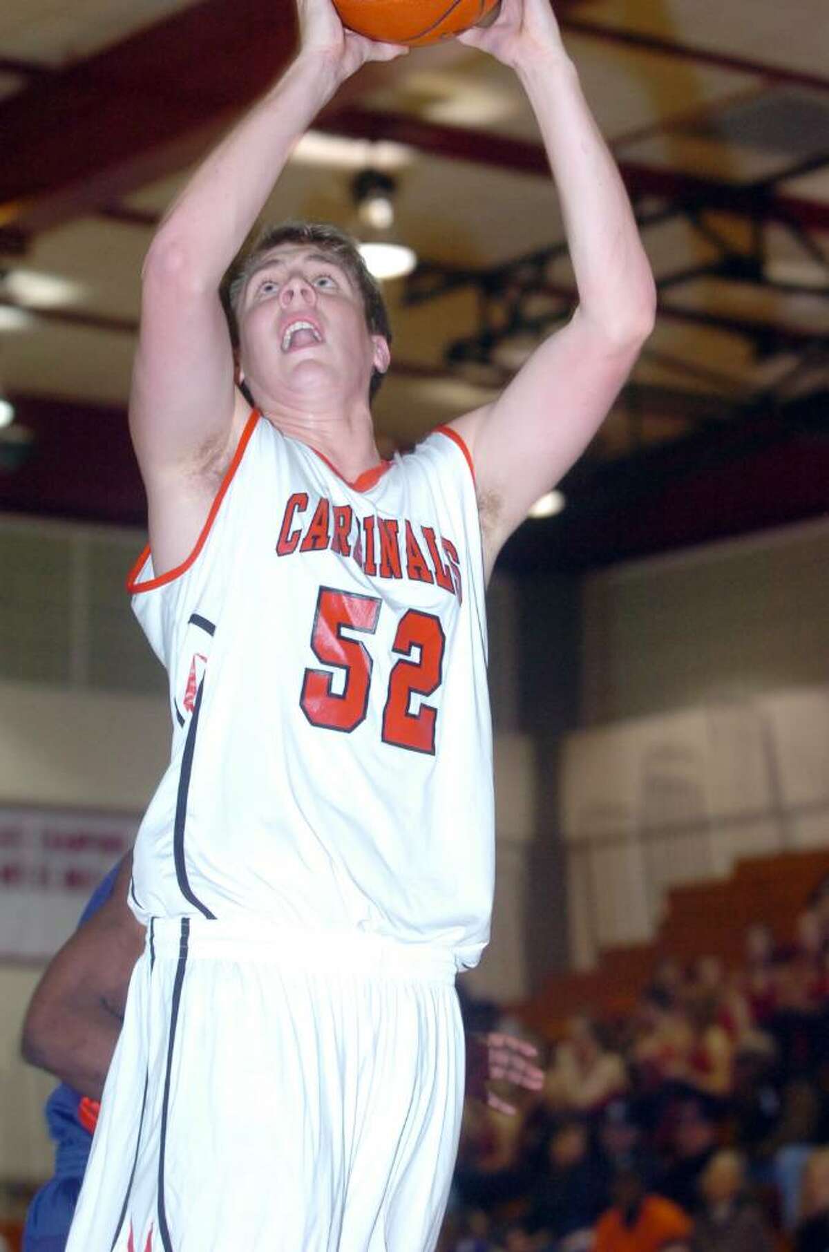 Greenwich edged by McMahon in season-opener