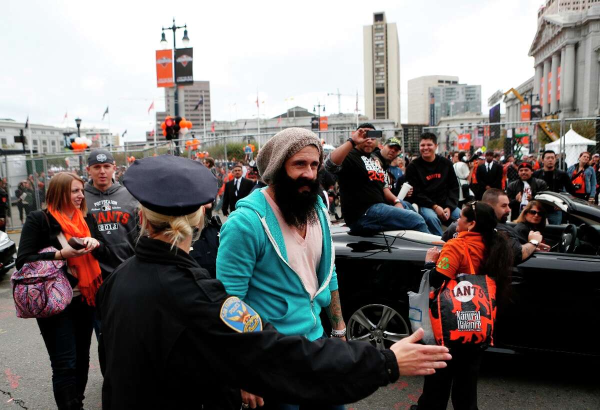 Former Giant Brian Wilson's resurfaces with no beard and a new sport