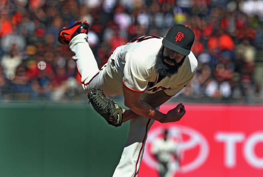 Former Giant Brian Wilson's resurfaces with no beard and a new sport ...