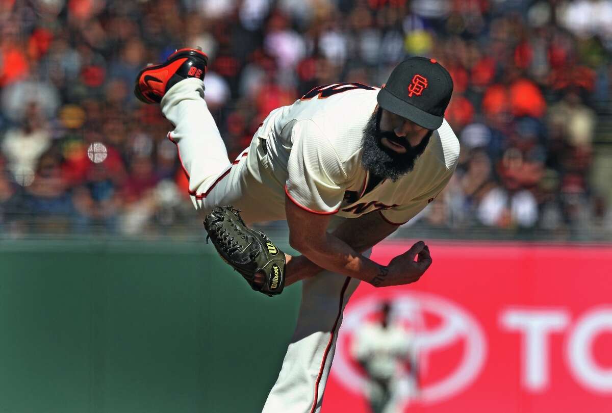 Former Giant Brian Wilson's resurfaces with no beard and a new sport
