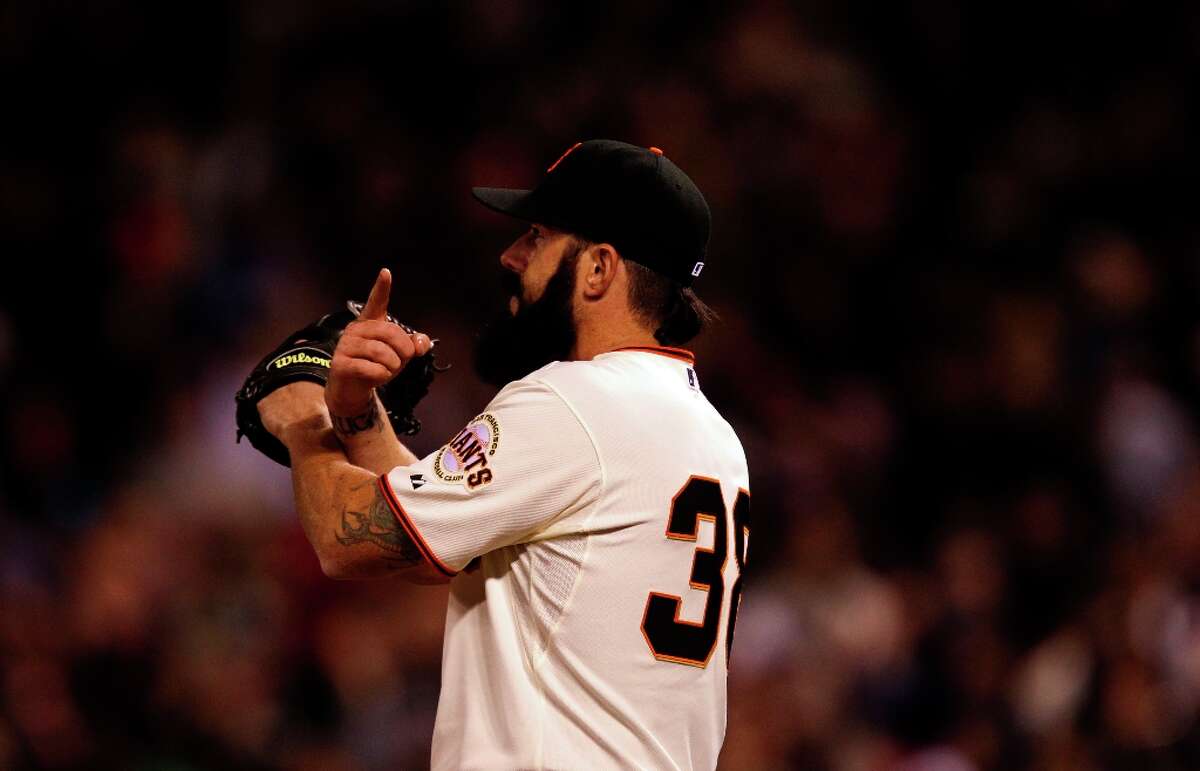 Former Giant Brian Wilson's resurfaces with no beard and a new sport