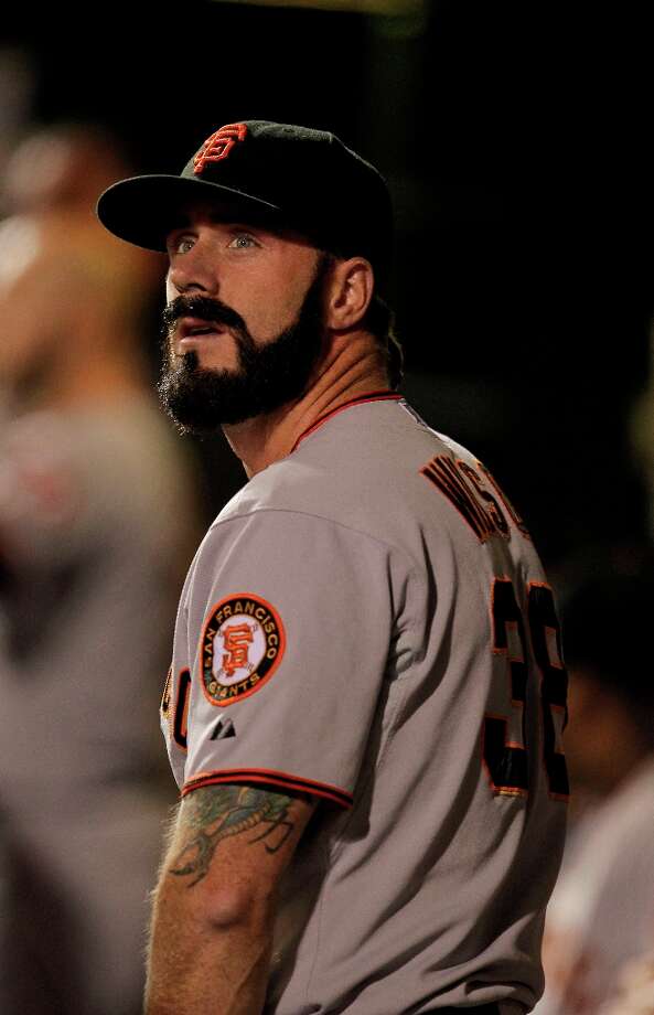 Former Giant Brian Wilson's resurfaces with no beard and a new sport ...