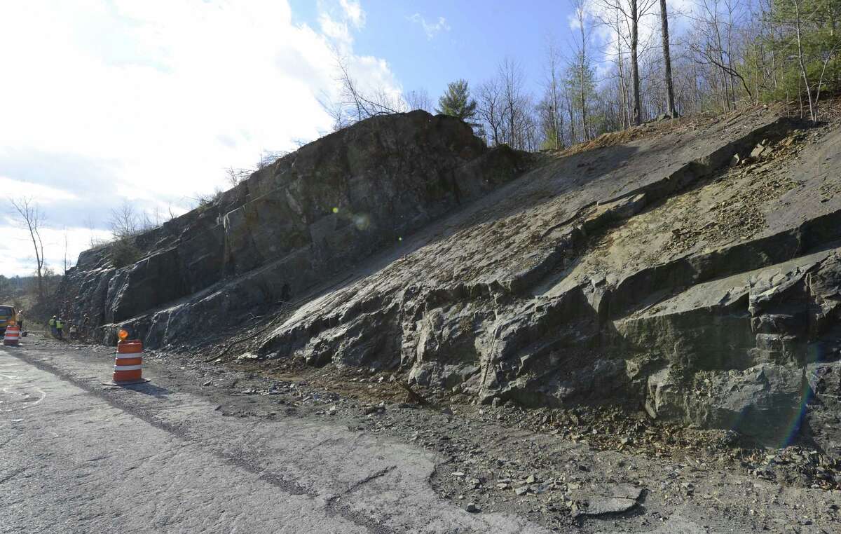 Photos: Rock slide work continues