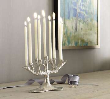 Menorahs branch out from traditional