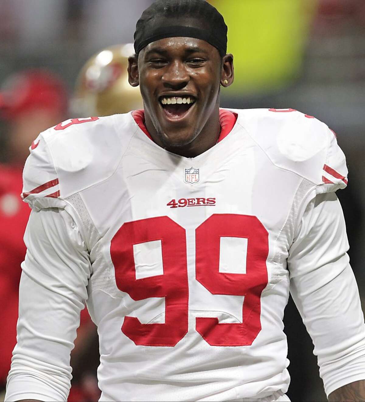 49ers' Smith in historic sack race