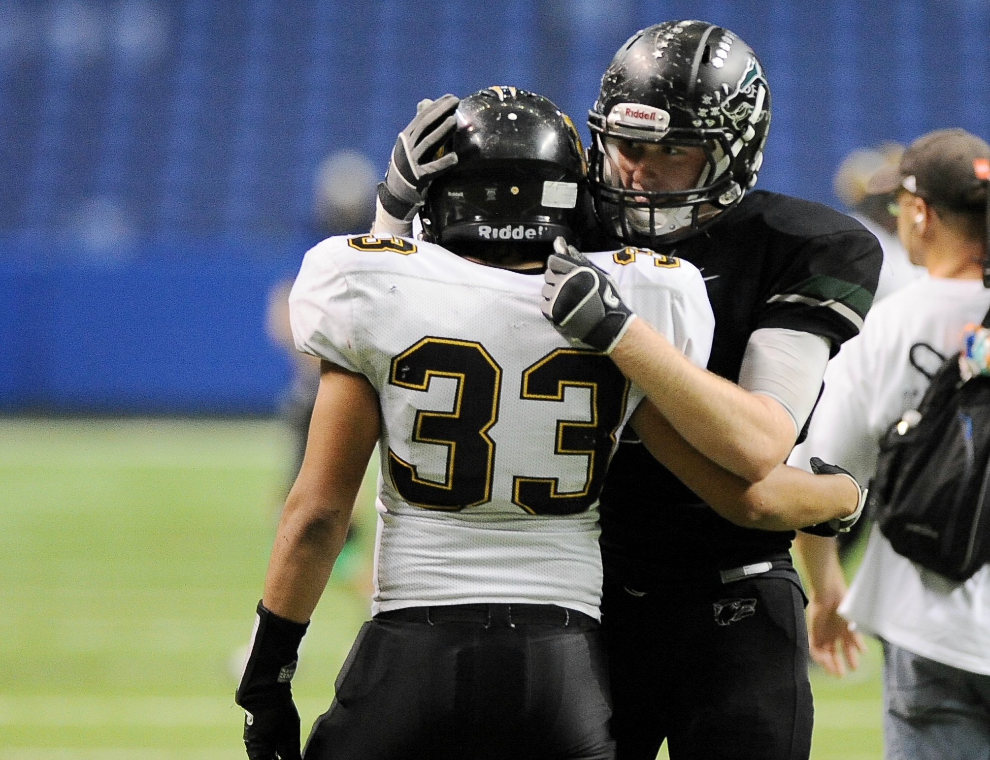 On new stage, Brennan slips