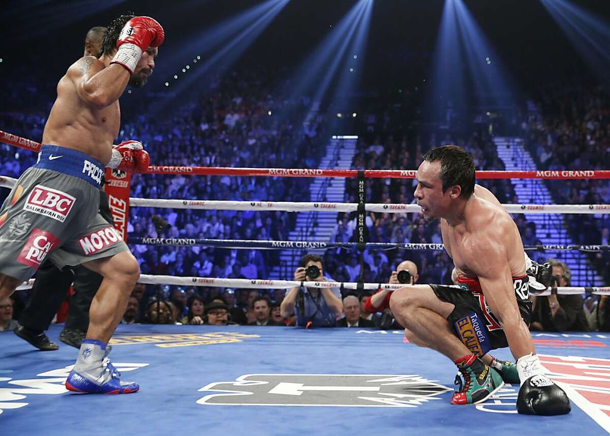 Marquez knocks out Pacquiao in round 6