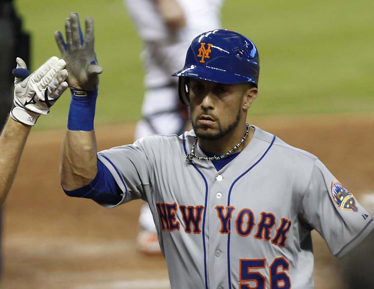 Torres pleased to be back with Giants