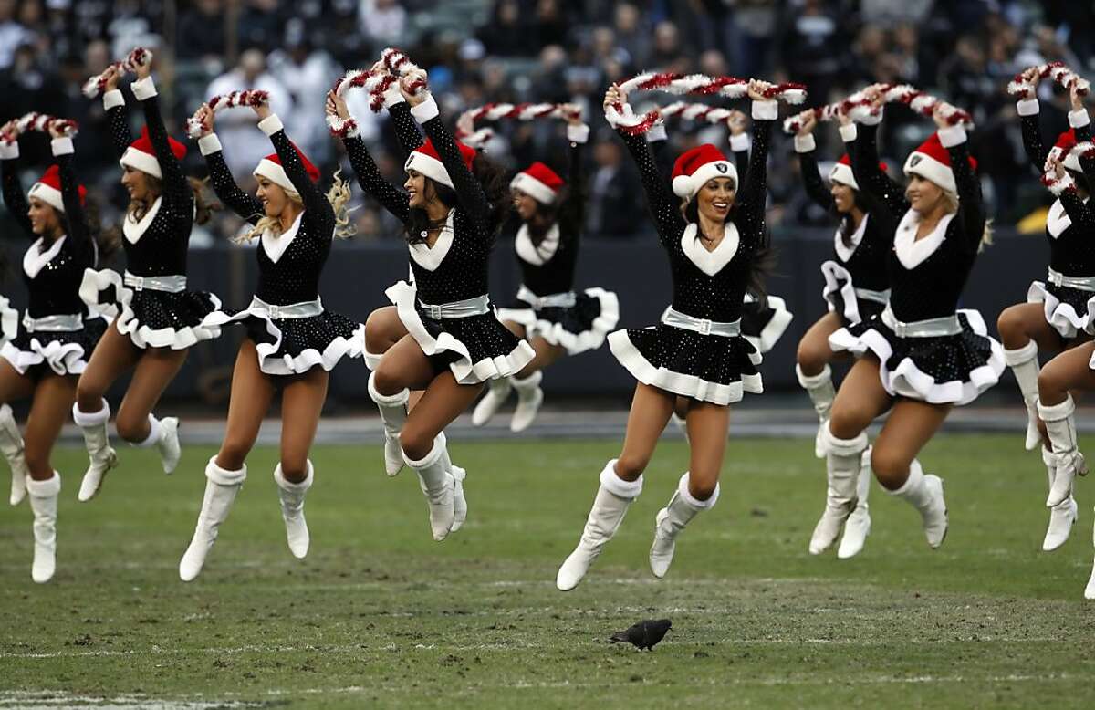 Raiders cheerleader sues, says pay is less than $5 an hour