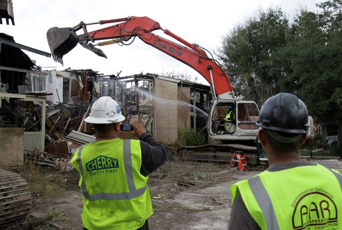 Demolition of blighted apartments takes place