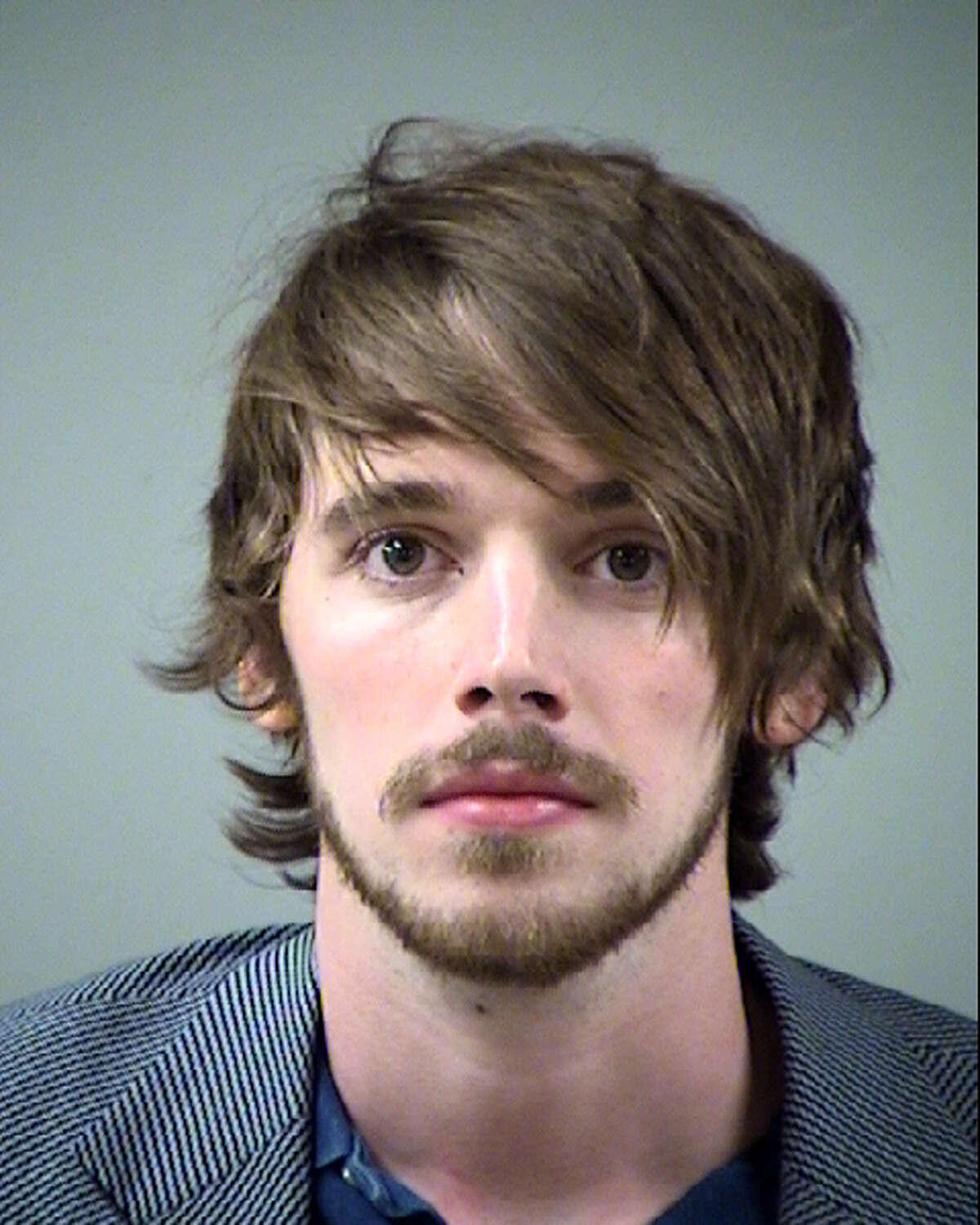 Car goes airborne in the Dominion, crashes into garage