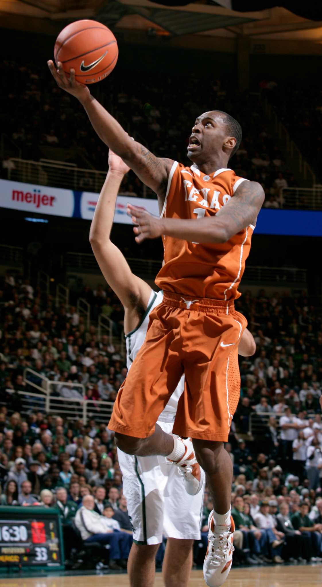 Nix, Michigan State deny Horns late