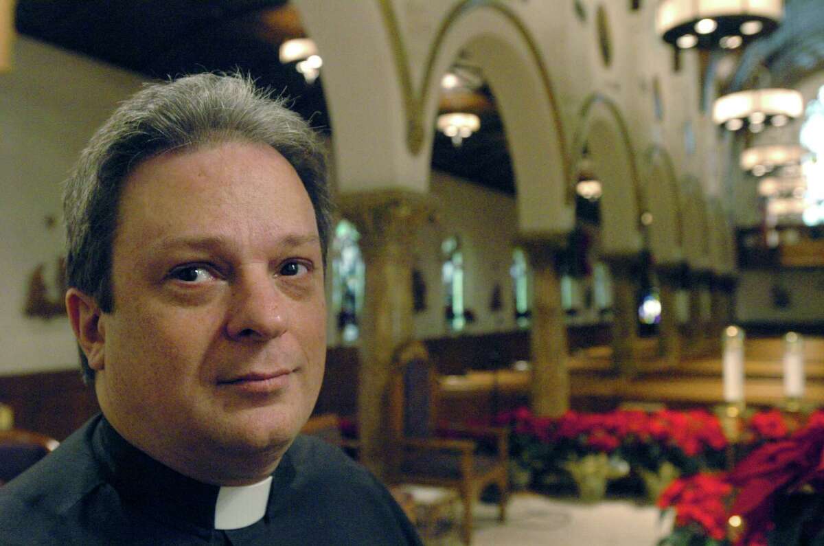 Greenwich priest comforts Newtown 'family'