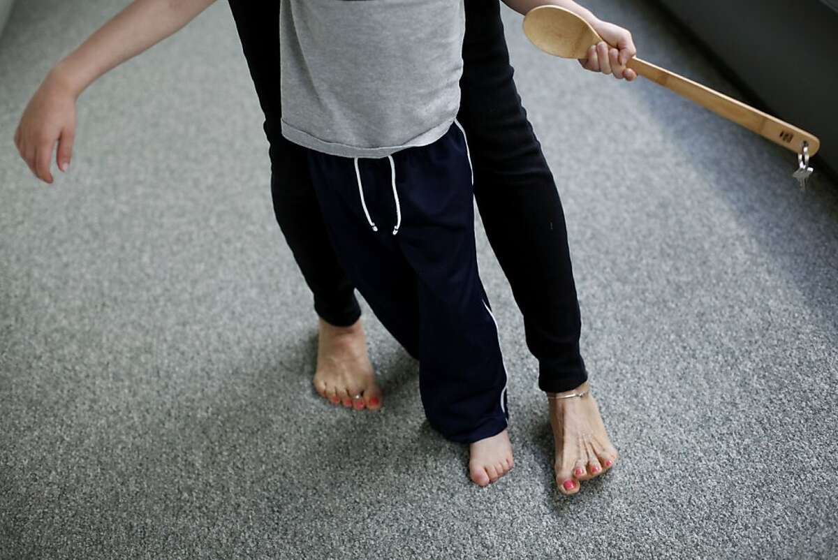 To help kids move, docs try Rolfing
