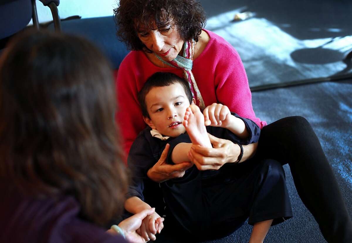 To help kids move, docs try Rolfing