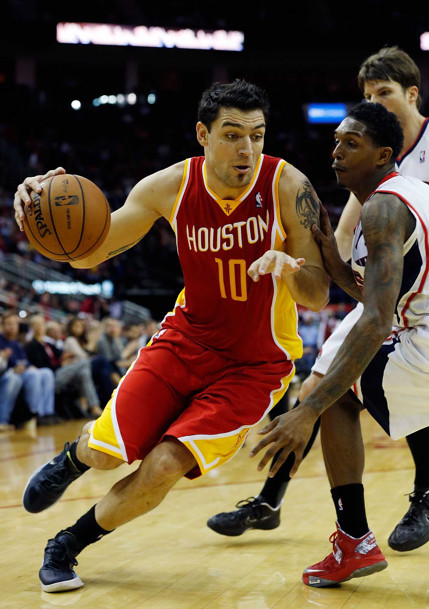 Delfino leads Rockets past Hawks