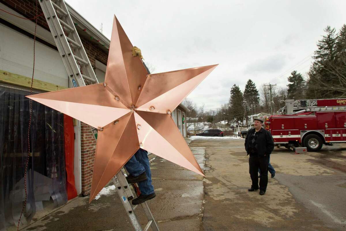 Stars rise on firehouse in Newtown