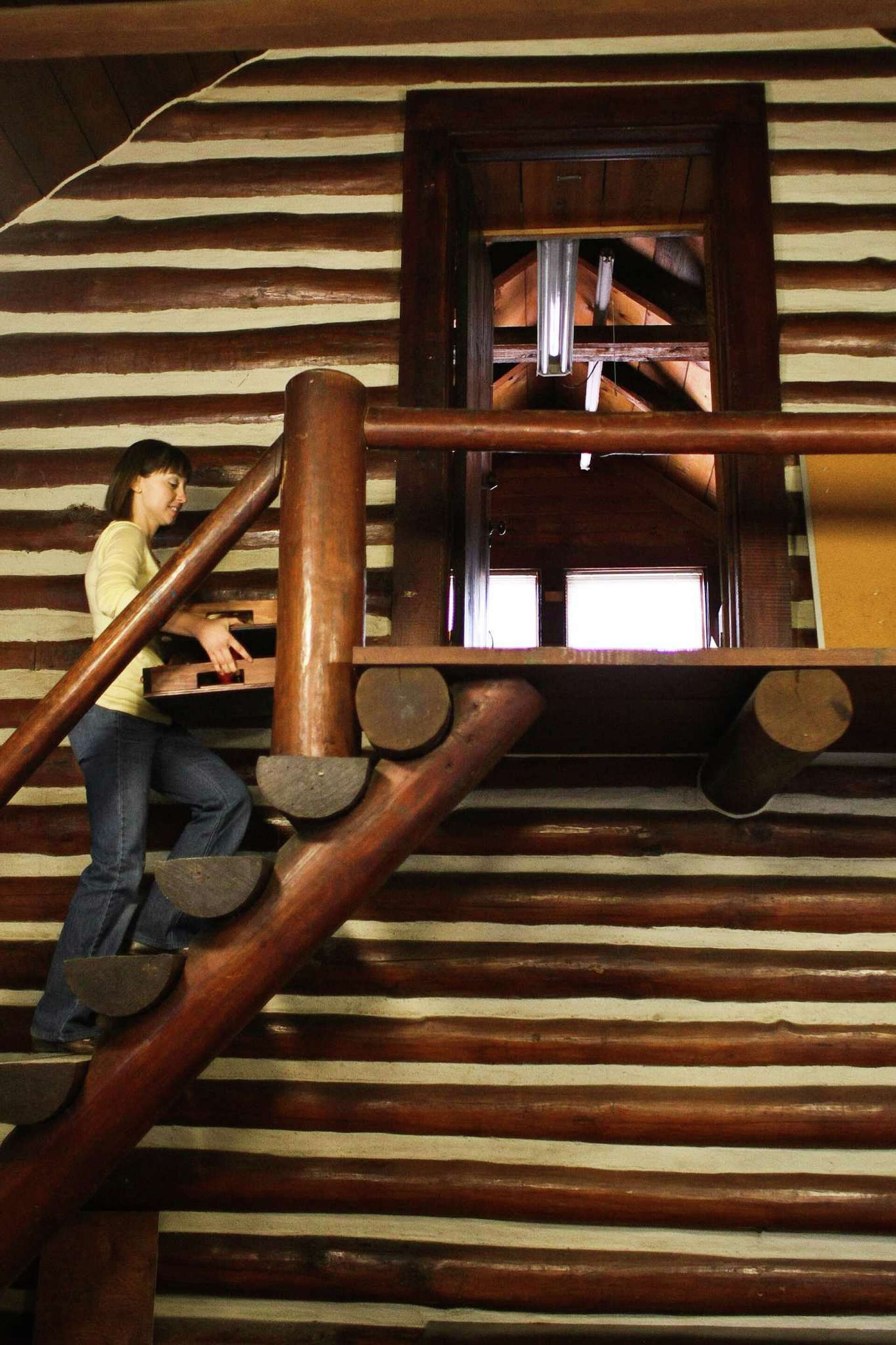 Log cabin in city's heart gets new lease on life