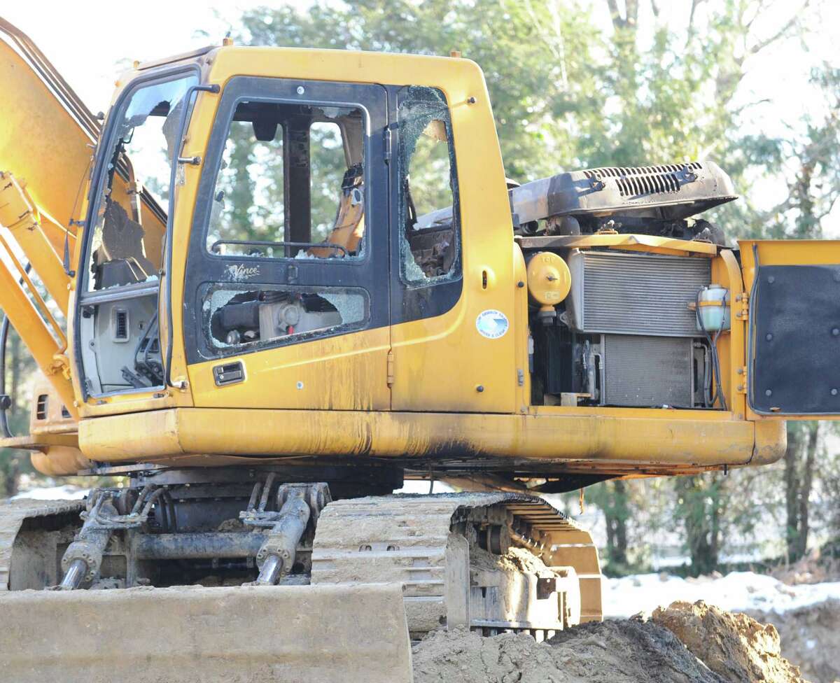 Police probe excavator fire