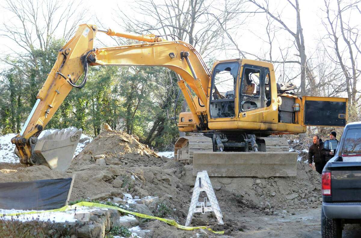 Police probe excavator fire