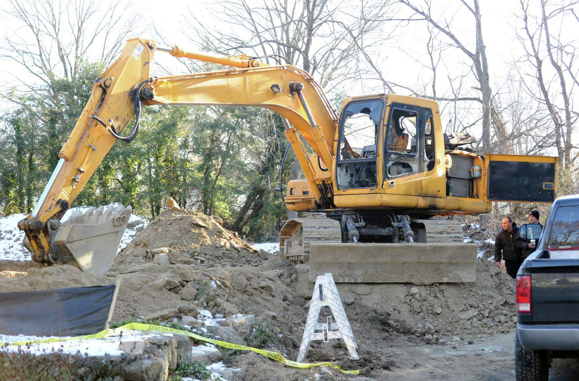 Police probe excavator fire