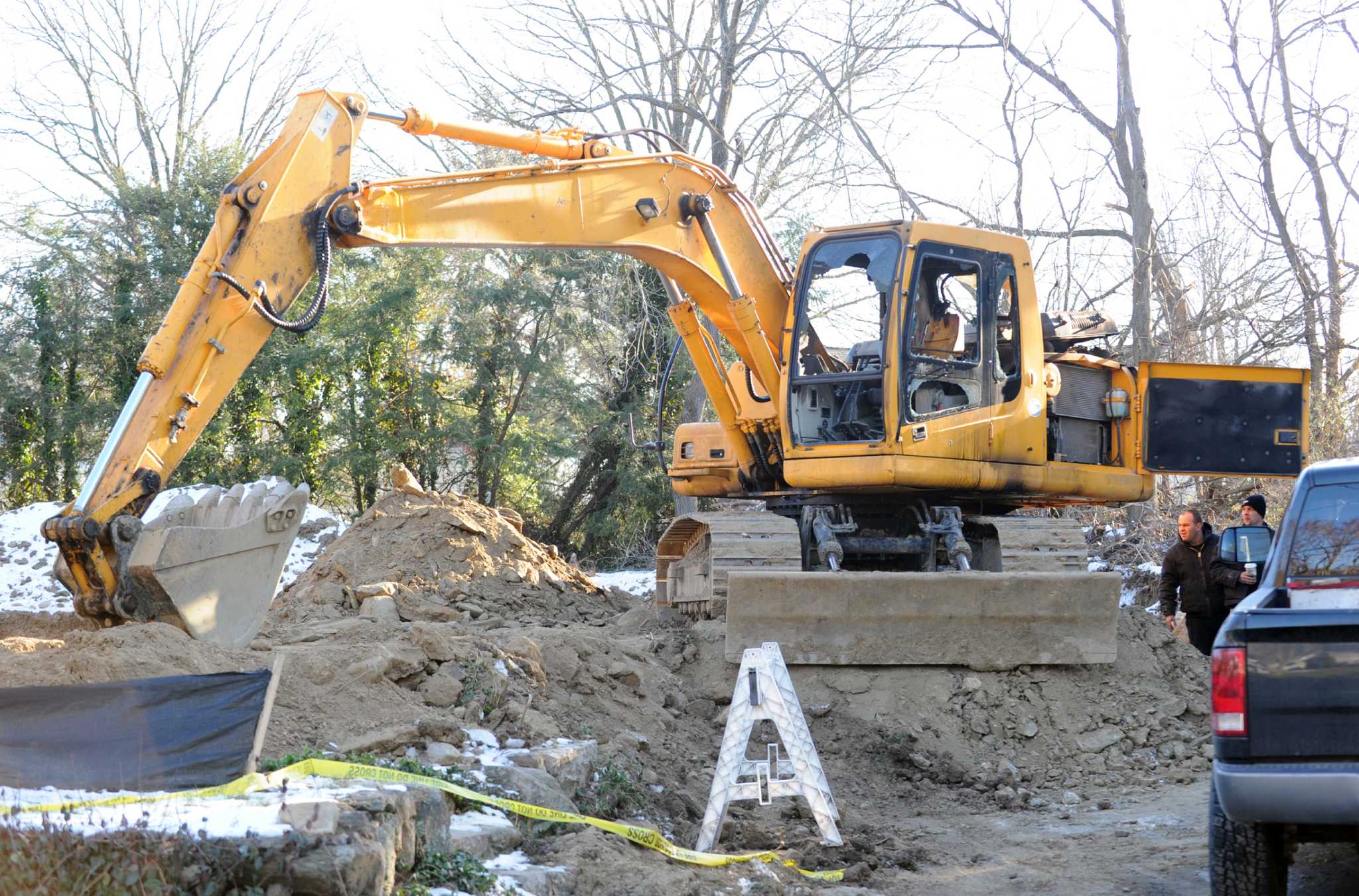 Police probe excavator fire