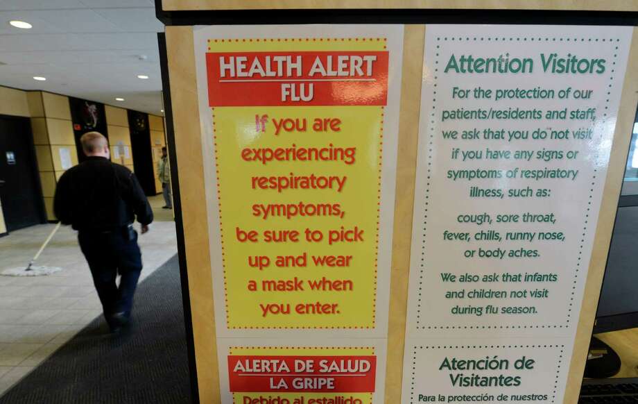 Flu outbreak filling ERs - Times Union