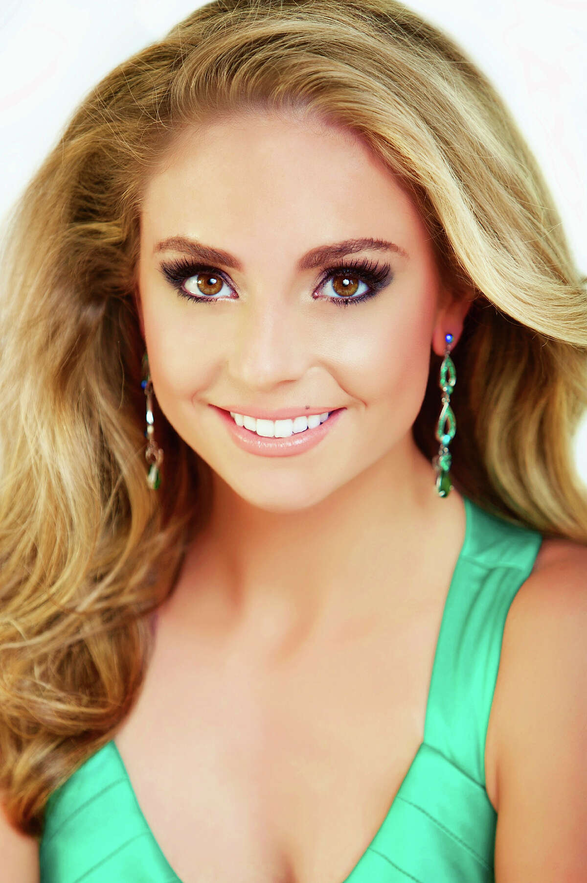 Miss Texas' first pitch off target at Rangers game