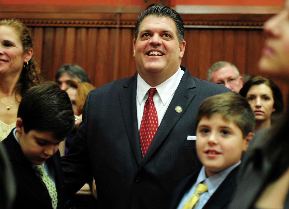 Malloy: 'More guns are not the answer'