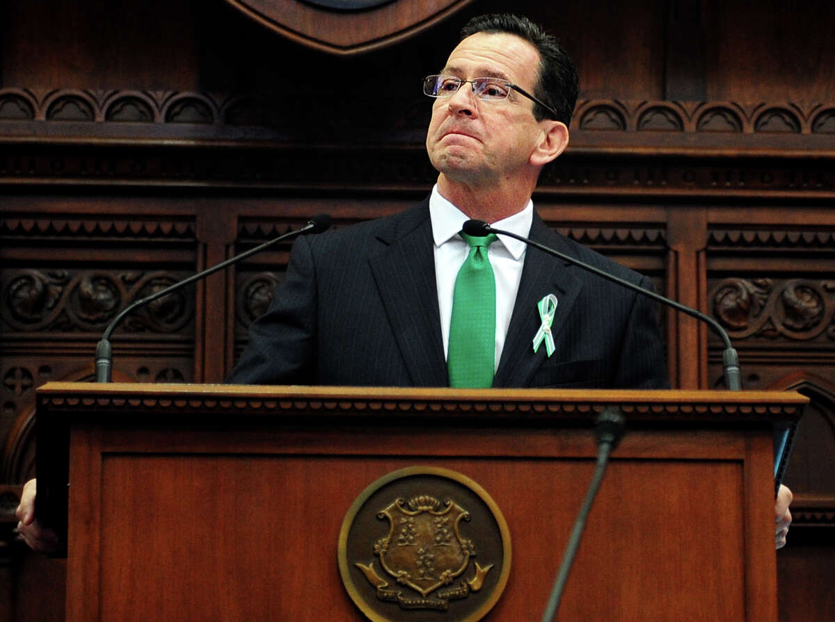Malloy: 'More guns are not the answer'