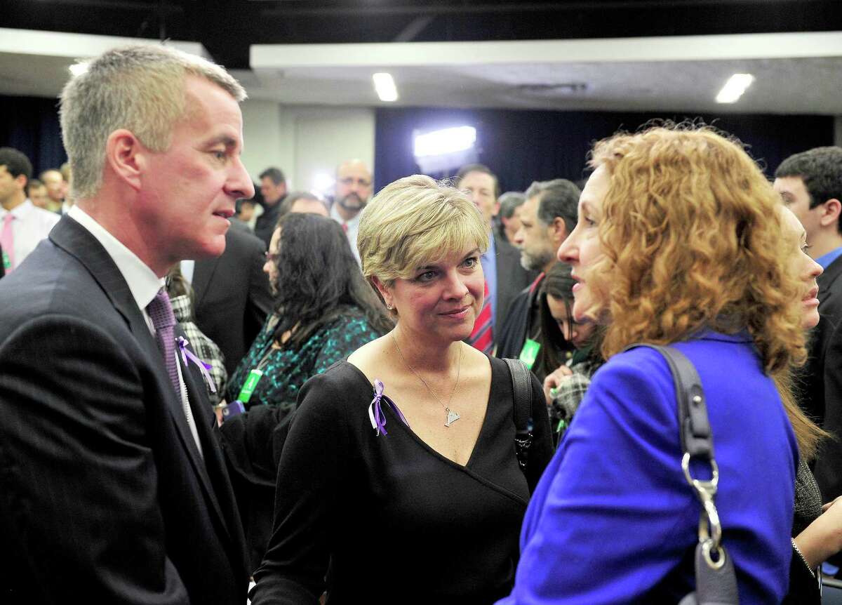 Newtown families, others, offer cautious support