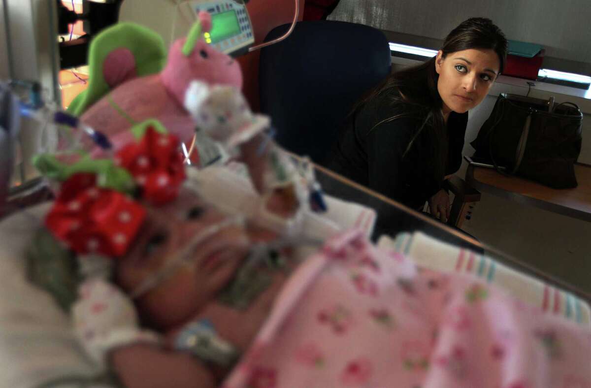 Baby born with heart outside her body goes home