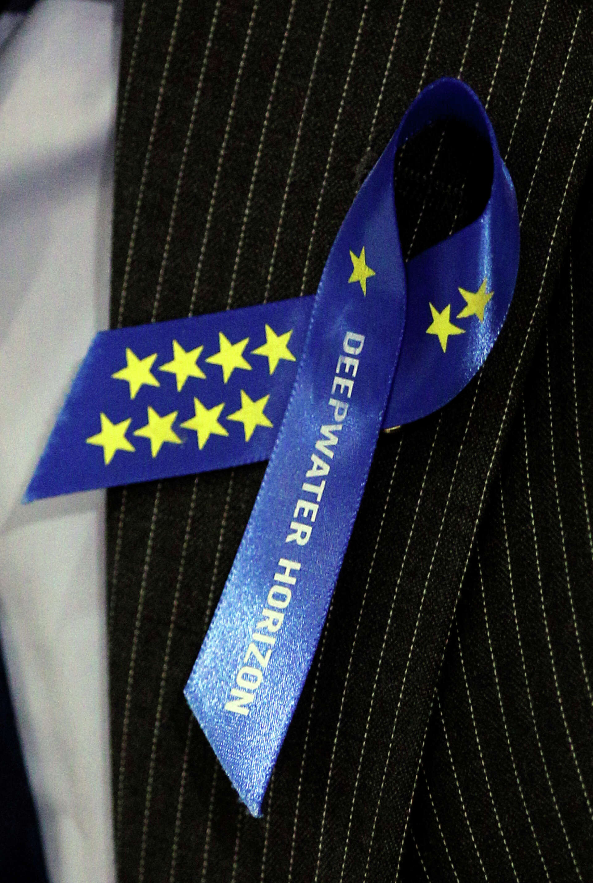 Rig survivor wants day in court before BP deal approved