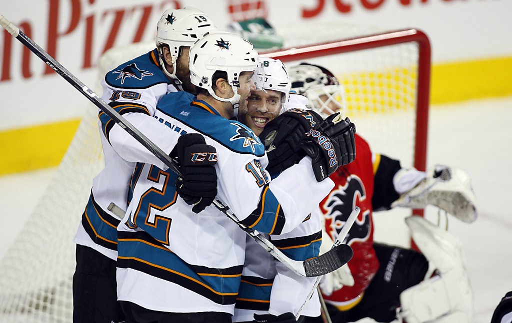 Marleau's 2 goals lead Sharks in opener
