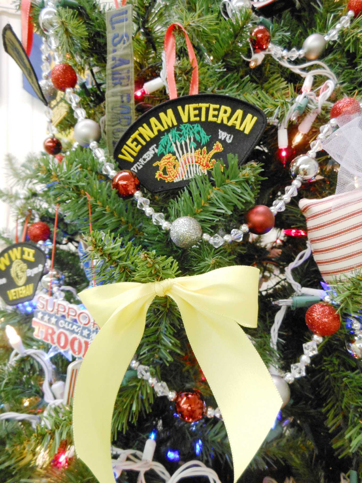 Rosenberg VFW remembers veterans with insignia, patches and yellow ...