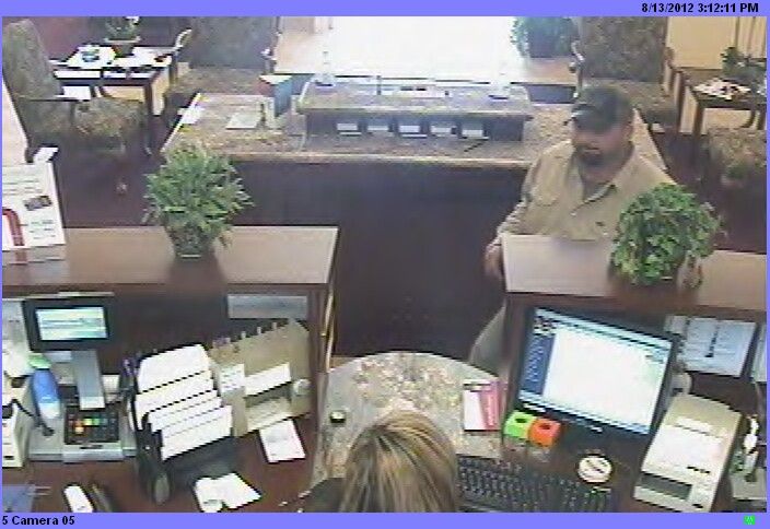 Nederland man gets prison sentence for robbing Mid-County bank Nederland man gets prison sentence for robbing Mid-County bank