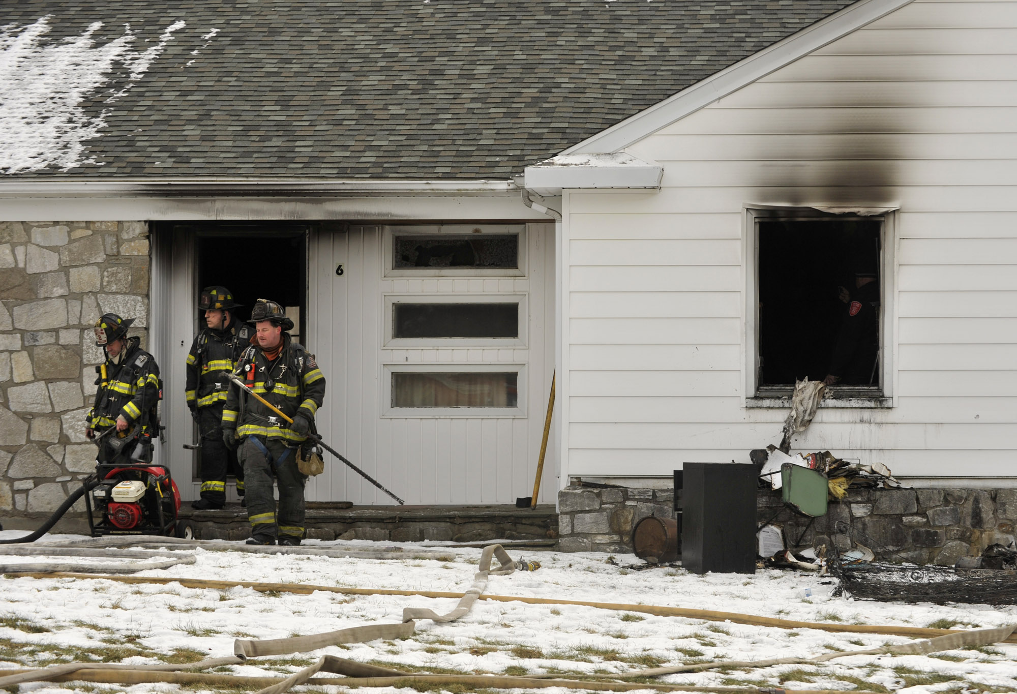 Firefighter saves man from burning house