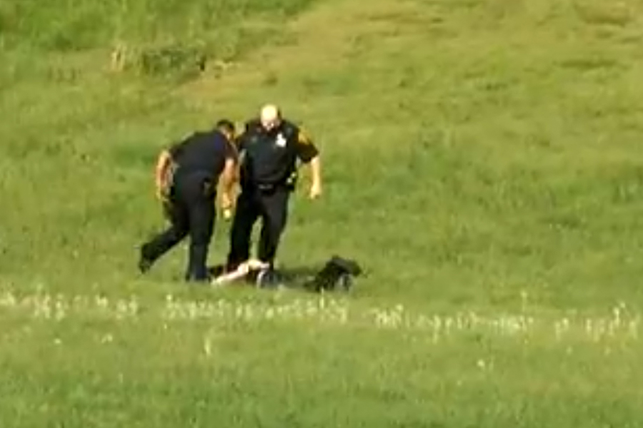 Video shows police Tasering, stomping suspect