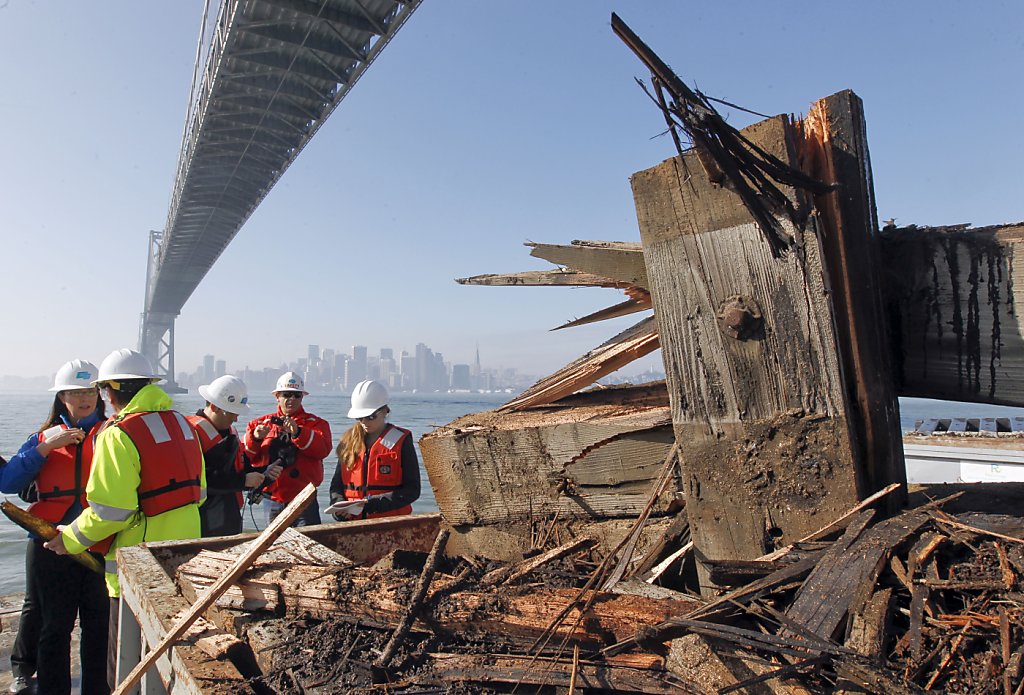 Bridge repair begins with cleanup