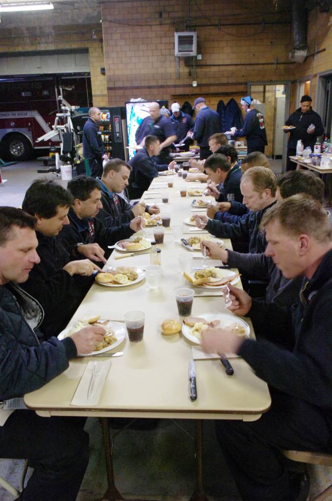 Firefighters cook Christmas feast for 'second family'