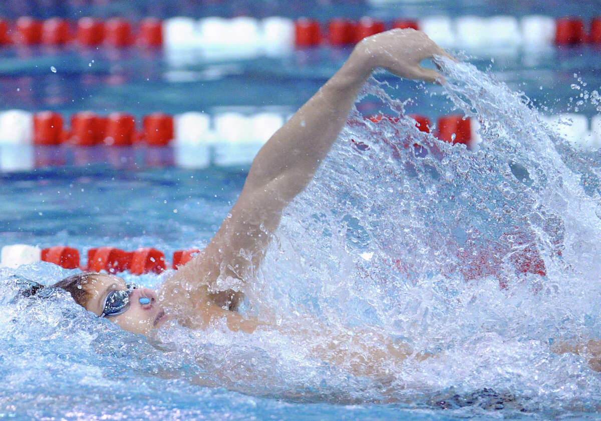 Greenwich swimmers cruise past Staples